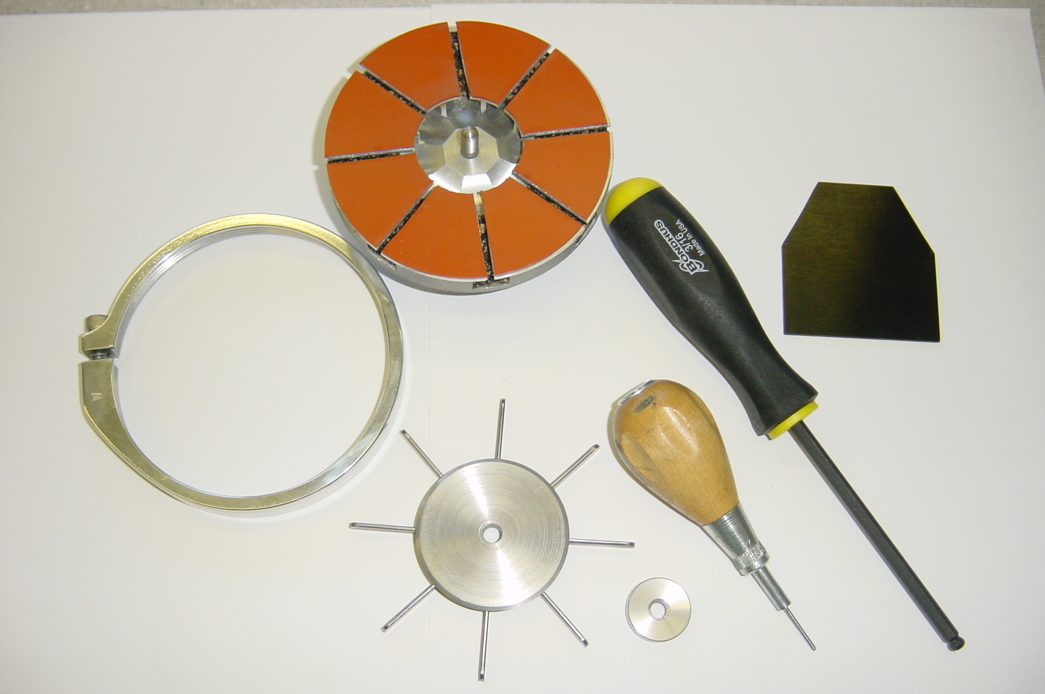 Taber Abraser - Specimen Mounting Options - Taber Industries